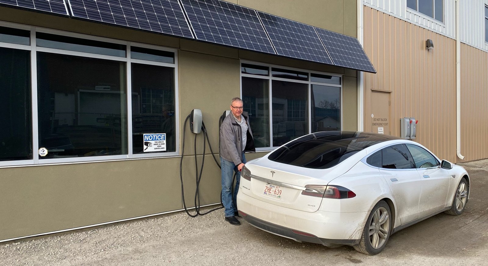 David-Kelly-with-his-Tesla-Model-S - Green Energy Futures